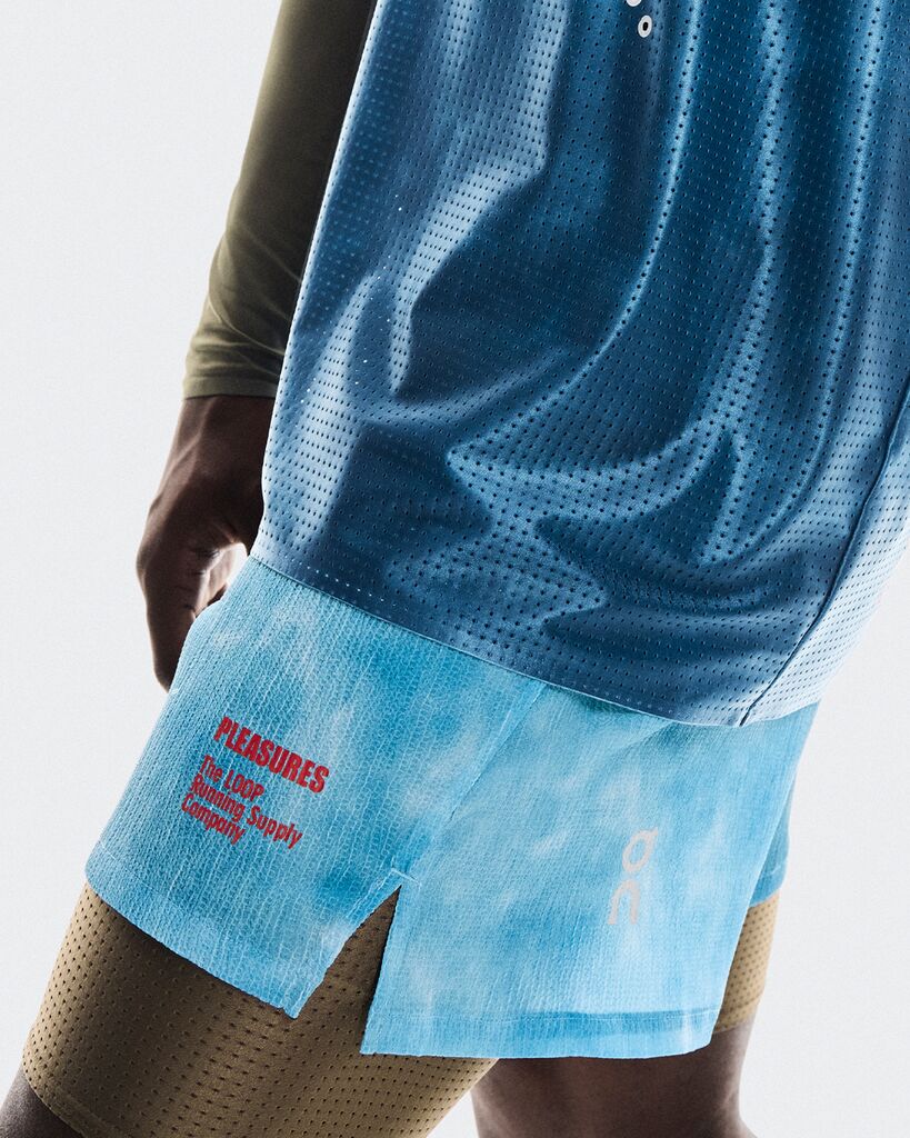 Shorts PLEASURES x The Loop · Hombre – Metta Running House